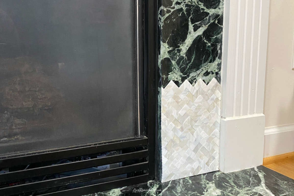 Fireplace Makeover - How to Tile Over a Fireplace Surround - Love Remodeled